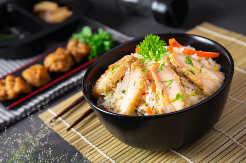 Fried Rice with Korean Style Chicken on Black Table Stock Photo - Image ...