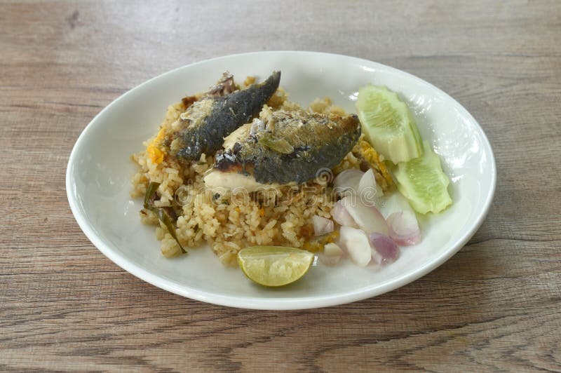 Fried Rice Mackerel Fish Couple Egg with Slice Cucumber and Lemon on ...