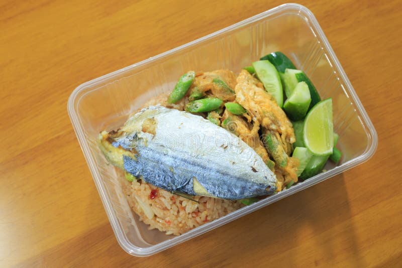 Fried Rice with Mackerel Fish in a Plastic Box that Can Be Heated in ...