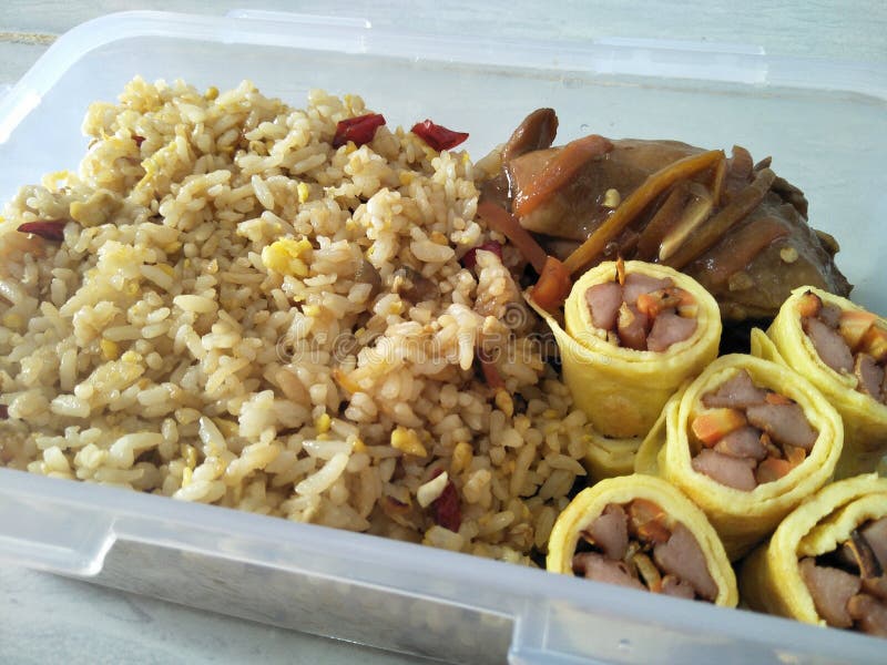 Fried Rice with Omelette Roll and Soy Sauce Chicken for Lunch Stock ...