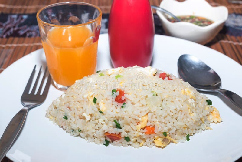 Fried Rice with Orange Juice Stock Photo - Image of dinner, closeup ...