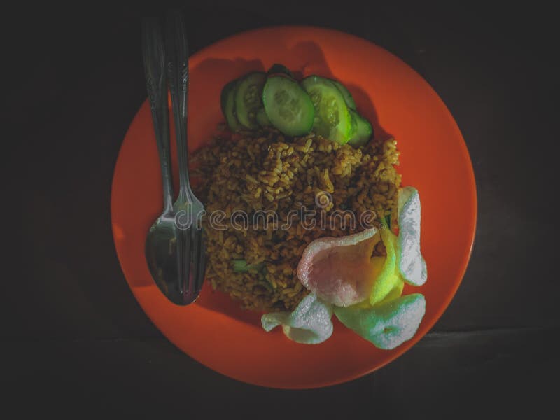 Fried Rice with Orange Plate on Red Table Lightroom Editï¿¼ Stock Photo ...