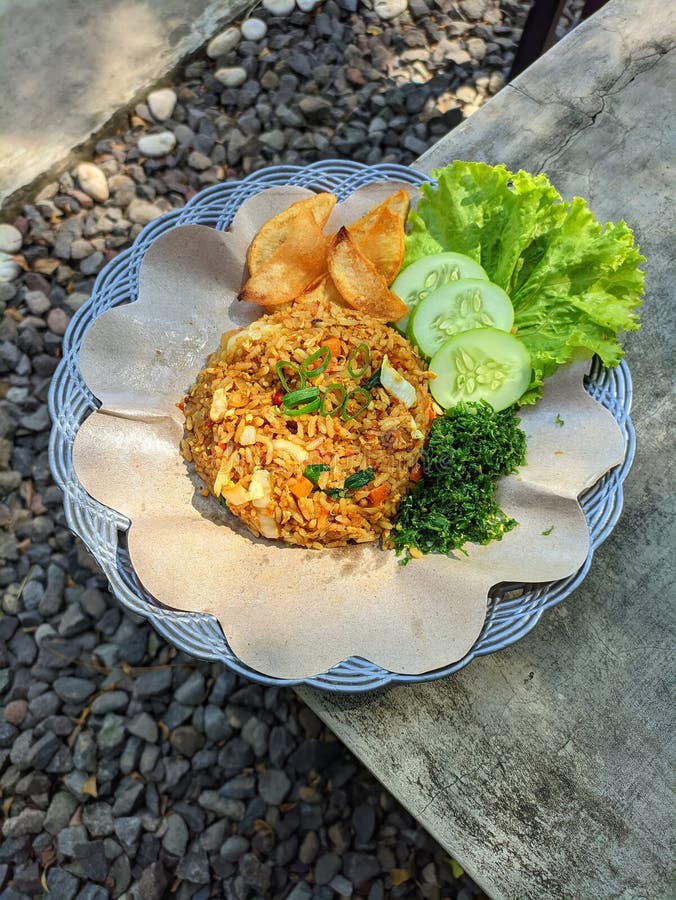 Fried Rice Placed on a Plate and Covered with Brown Rice Paper and ...