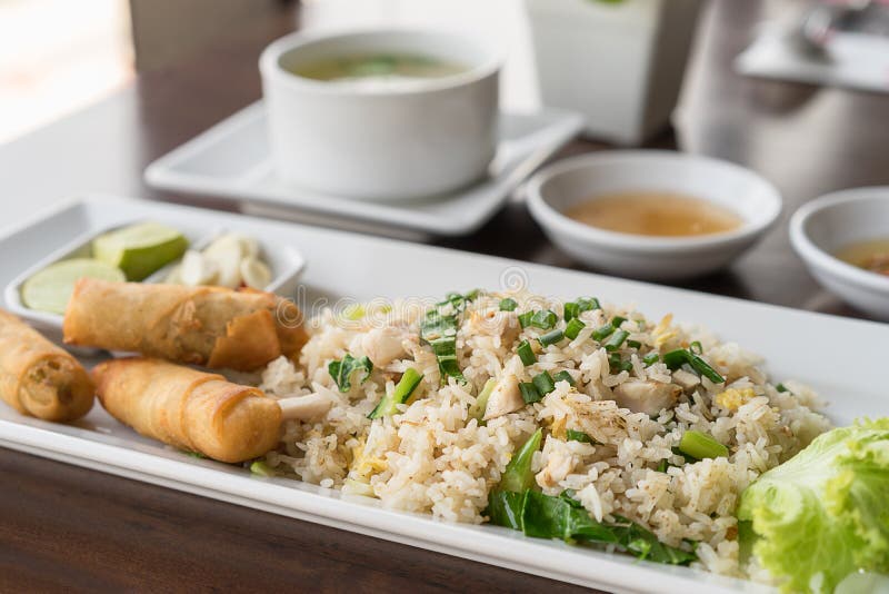 Fried Rice with Salted Fish and Fried Spring Rolls. Stock Image - Image ...