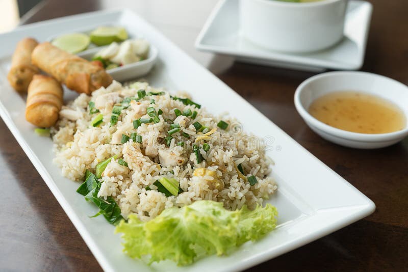 Fried Rice with Salted Fish and Fried Spring Rolls. Stock Image - Image ...