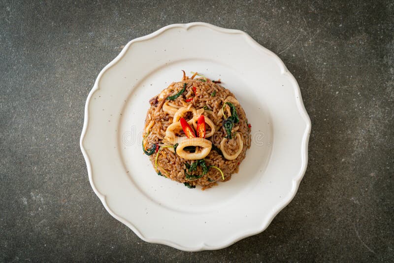 Fried Rice with Squid and Basil in Thai Style Stock Image - Image of ...