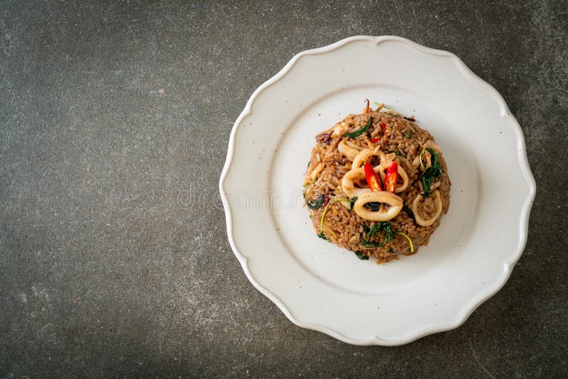 Fried Rice with Squid and Basil in Thai Style Stock Photo - Image of ...