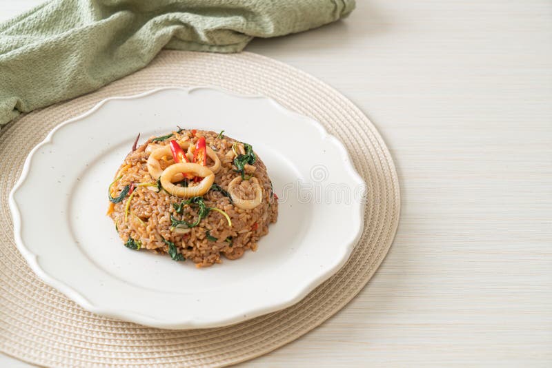 Fried Rice with Squid and Basil in Thai Style Stock Photo - Image of ...