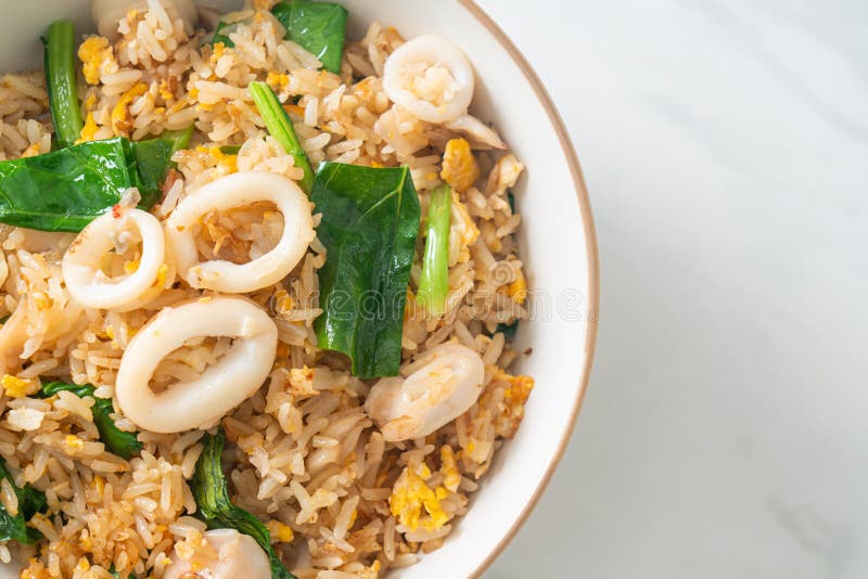 Fried Rice with Squid or Octopus Stock Photo - Image of sauce, jasmine ...