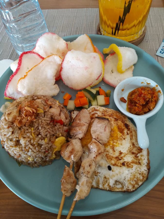 Fried Rice with Taichan Satay and Egg Stock Photo - Image of taichan ...