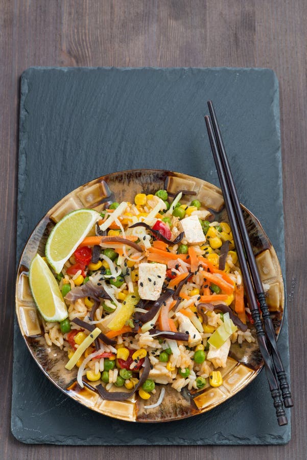 Fried Rice with Tofu, Vegetables , Vertical, Top View Stock Photo ...