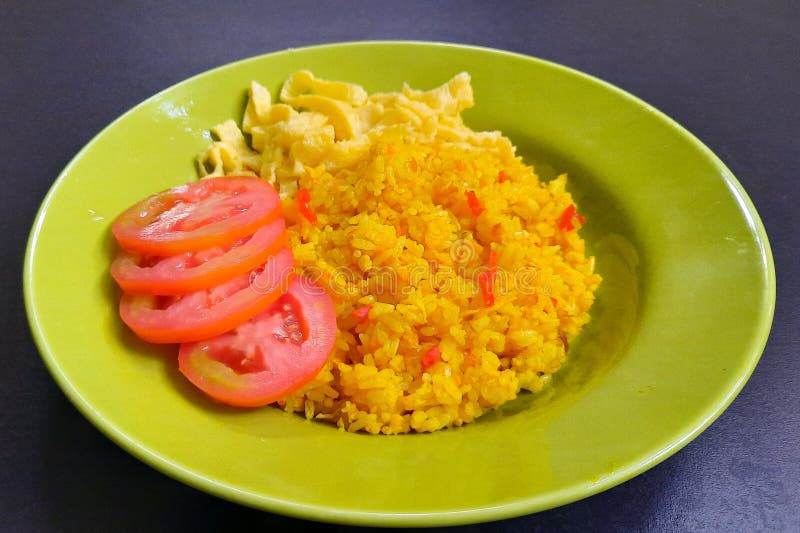 Fried Rice with Tomato and Fried Egg Topping Stock Photo - Image of ...