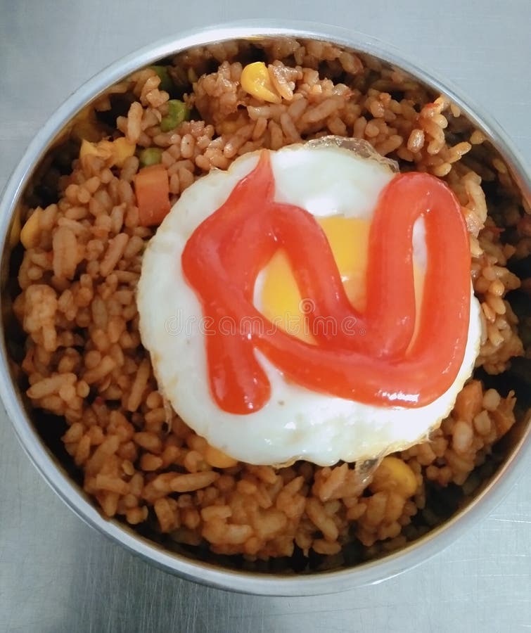 Fried Rice with Toping Sunny Egg and Ketchup Stock Image - Image of ...