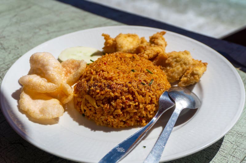 Fried Rice on White Plate. Delicious Fried Rice Served with Crispy ...