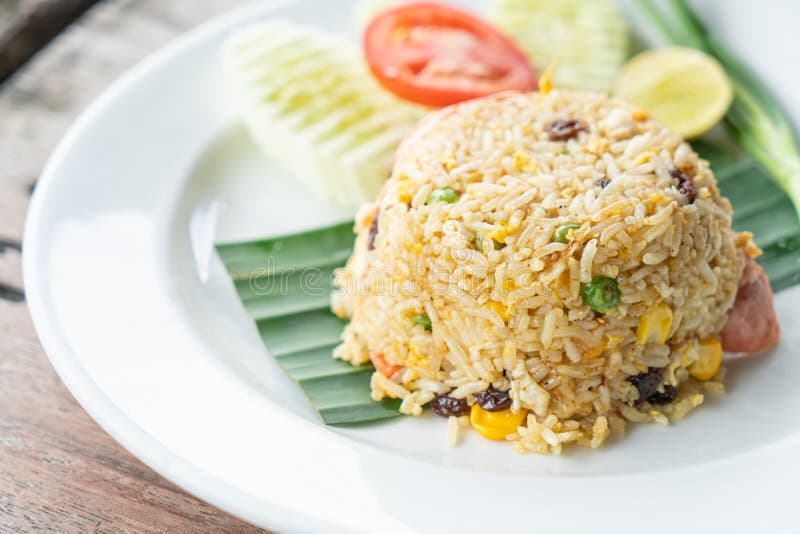 Fried rice on white plate stock image. Image of asian - 258002445