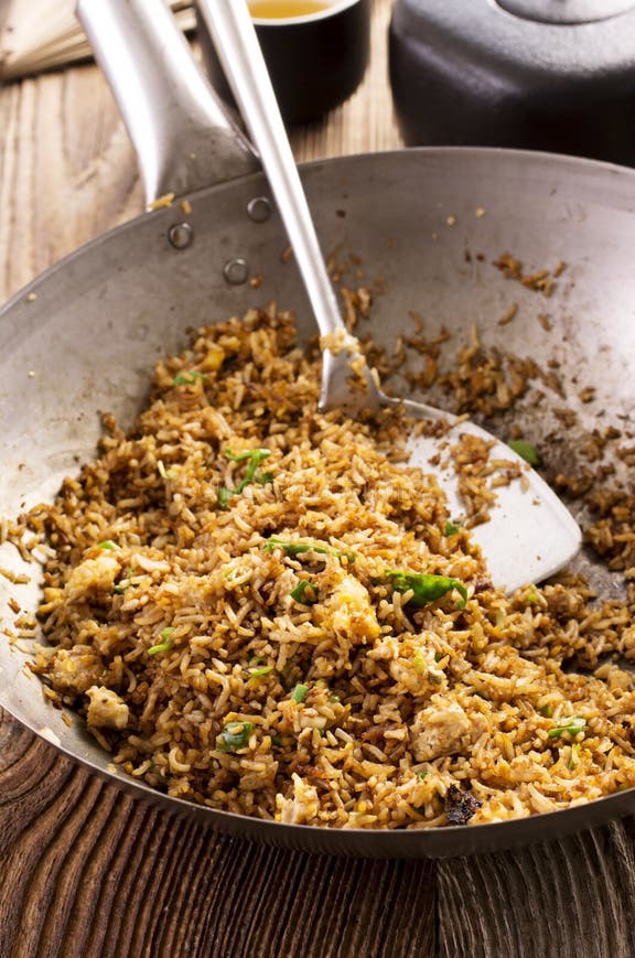 Fried Rice in Wok stock image. Image of dish, spring - 37647895
