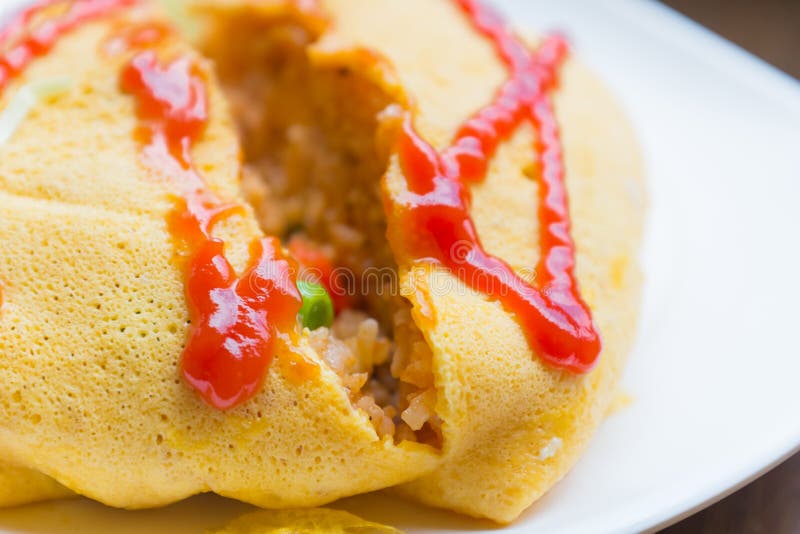 Fried Rice Wrapped with Omelette Stock Photo - Image of cuisine, dinner ...