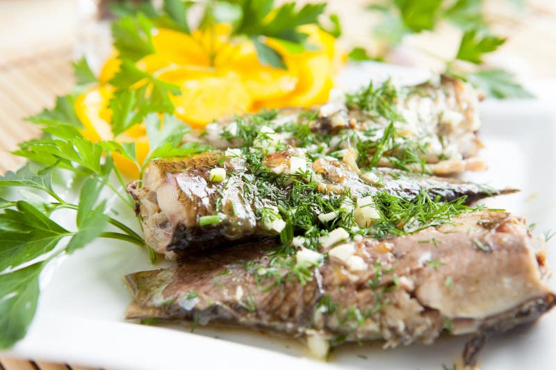 Fried River Fish with Garlic and Herbs Stock Image - Image of ...
