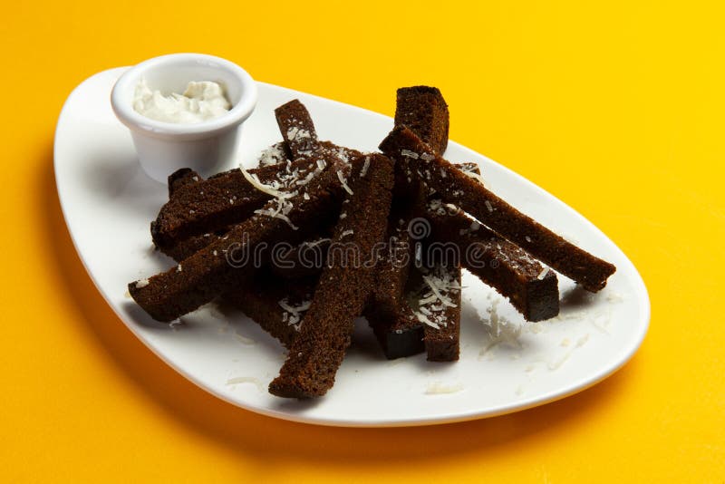 Fried Rye Croutons. on a Yellow Background Stock Photo - Image of ...