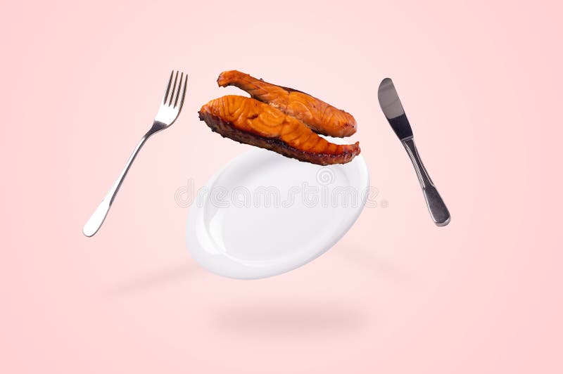 Fish Oil Falling Capsules in Transparent Flasks on a Pink Background ...