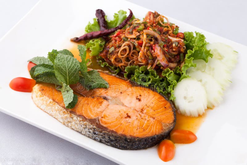 Fried Salmon Fish with Spicy Salad Stock Image - Image of sauce, salmon ...