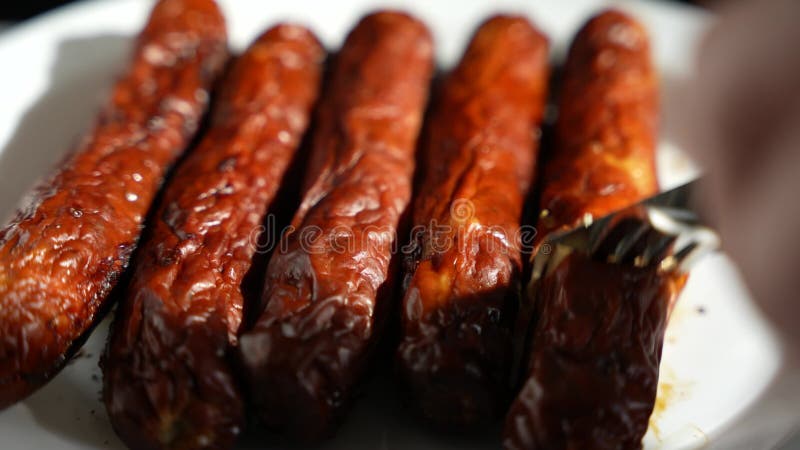 Fried Sausage Rotates on a White Plate. Stock Footage - Video of ...