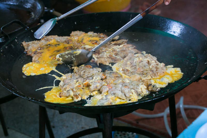 Fried Shell with Egg in a Hot Pan Stock Photo - Image of thailand ...