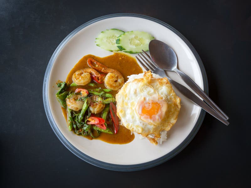 Fried Shrimp in Red Curry with Rice and Fried Egg Stock Photo - Image ...