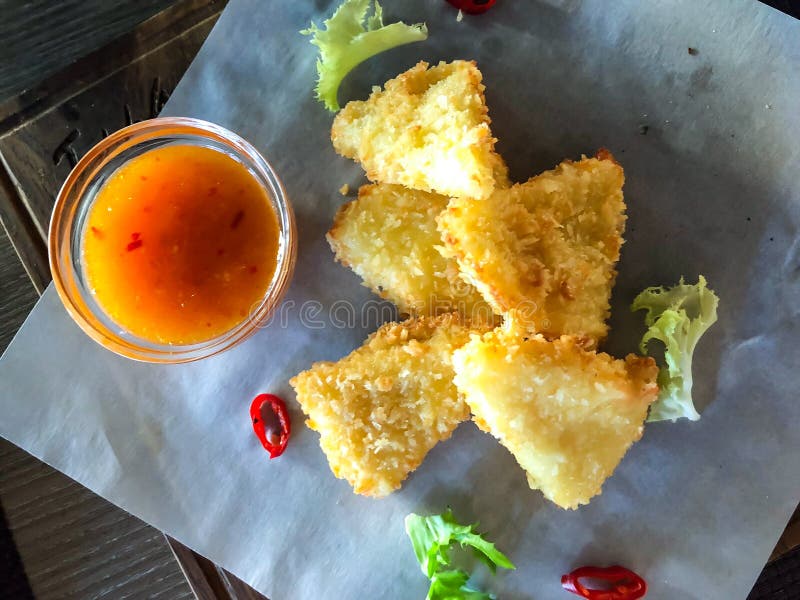 Fried Slices of Deep-fried Cheese, Hot Sauce Stock Photo - Image of ...