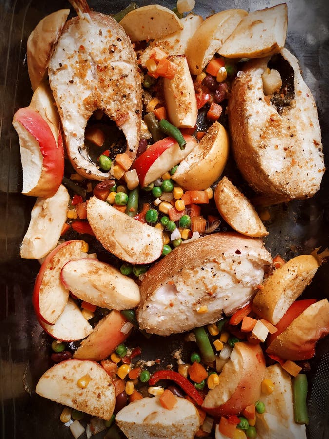 Fried Slices of Fish and Vegetables. Food Background. Stock Photo ...