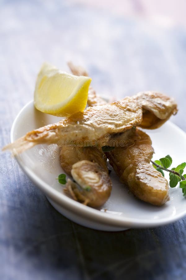 Fried small fish stock image. Image of greek, fried, vertical - 4392845