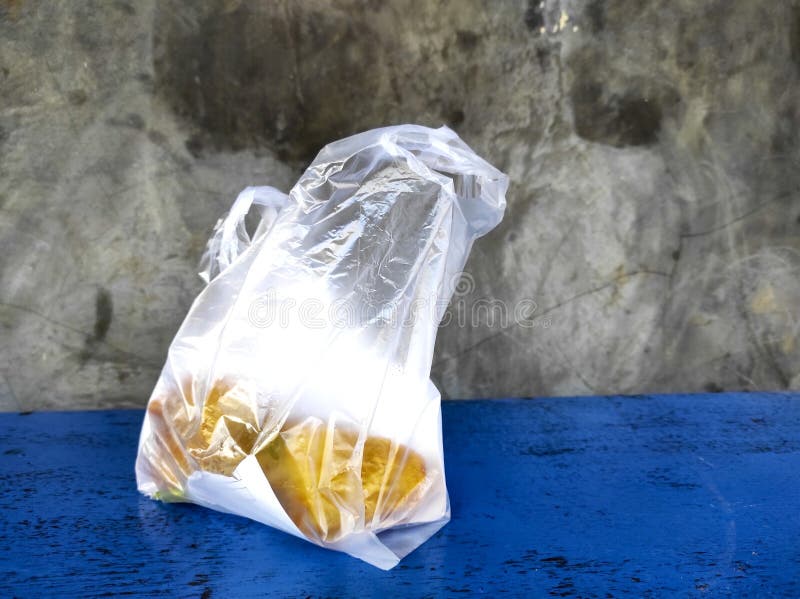 Fried Snacks in Plastic Bags Stock Photo - Image of lighting, leaf ...