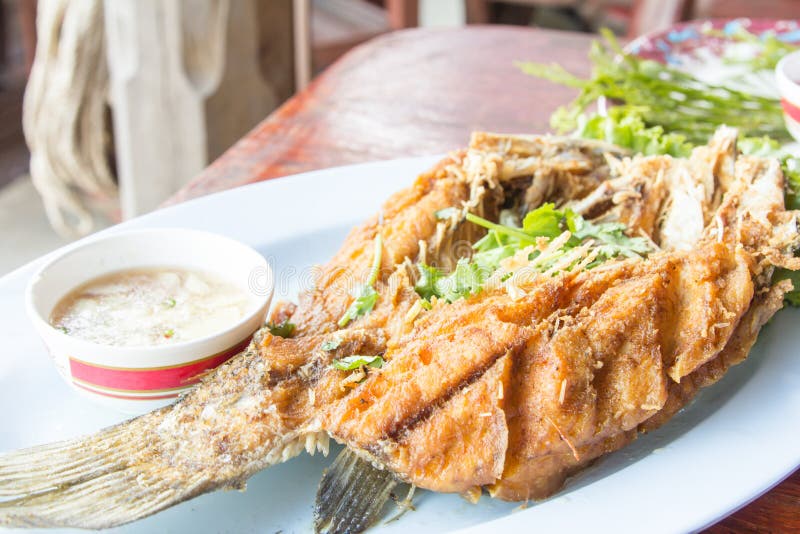 Fried Snapper at a Seafood Restaurant in Thailand Stock Image - Image ...