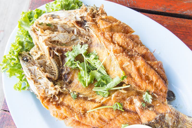 Fried Snapper at a Seafood Restaurant in Thailand Stock Image - Image ...