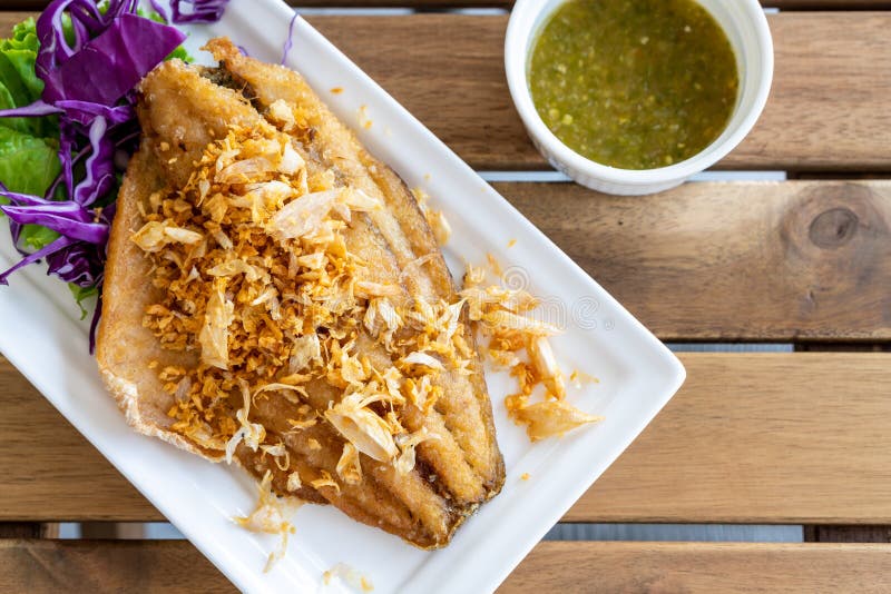 Fried Snapper Fish Fillet Com Alho Foto de Stock - Imagem de faixa ...