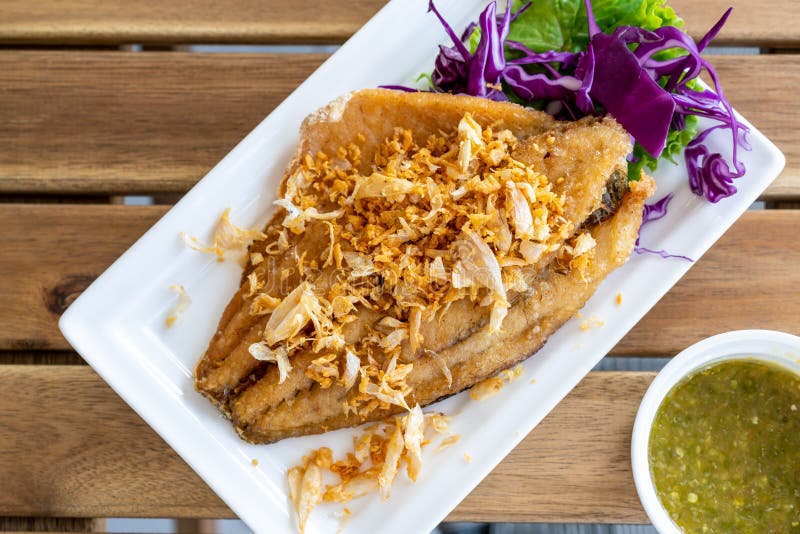 Fried Snapper Fish Fillet with Garlic Stock Photo - Image of food, fish ...