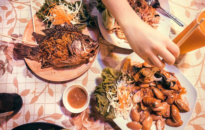 Fried Snapper Fish and Seafood on the Table of Fast Food Restaurant in ...