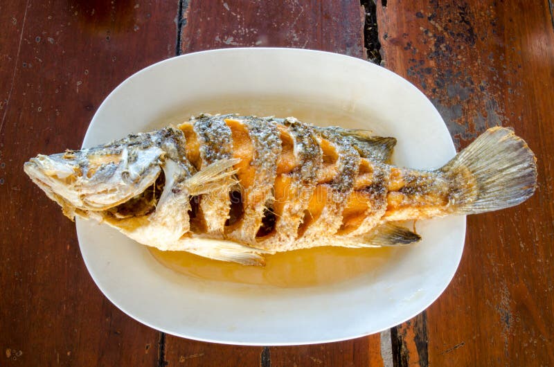 Fried Snapper on the White Plate Place Stock Photo - Image of grill ...