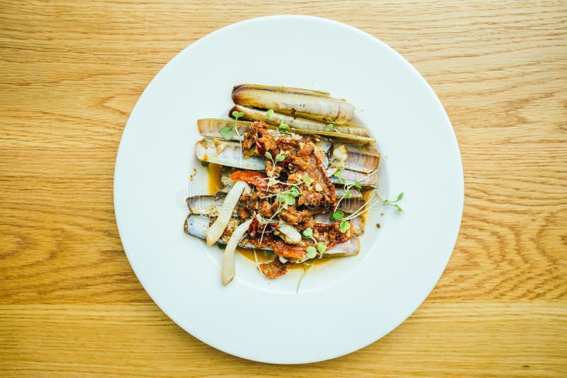 Fried spicy razor clams stock image. Image of shellfish - 96252739