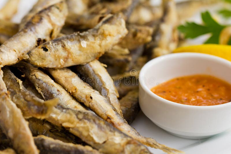 Fried sprat with souce stock image. Image of nutrition - 29625501