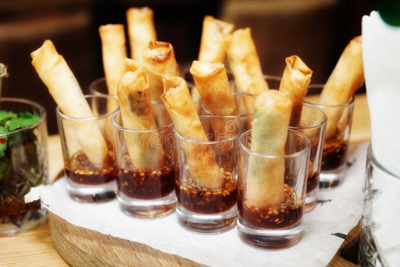 Fried Spring Rolls in Glasses with Sauce, Toned Stock Image - Image of ...
