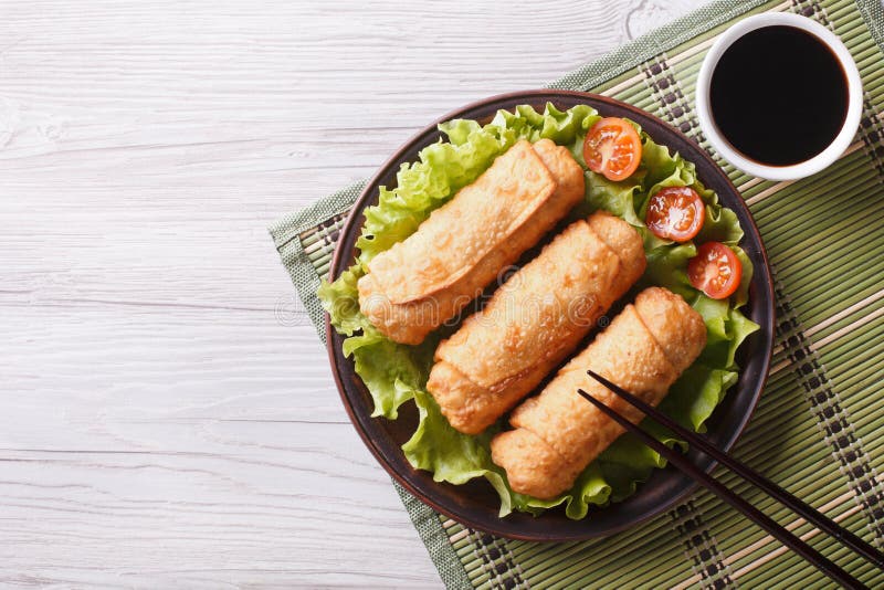Fried Spring Rolls on a Plate with Salad, Horizontal Top View Stock ...