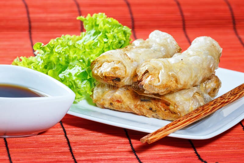 Fried Spring Rolls on Red Bamboo Mat Stock Image - Image of delicious ...