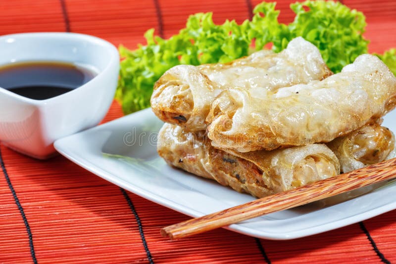 Fried Spring Rolls on Red Bamboo Mat Stock Photo - Image of japanese ...