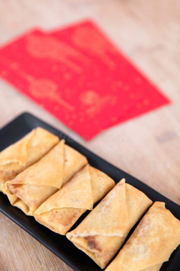 Fried Spring Rolls and Red Envelopes for Lichun Stock Image - Image of ...