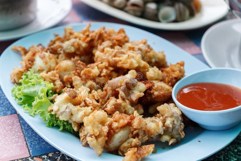 Fried Squid with Garlic with Chili Sauce Stock Photo - Image of ...