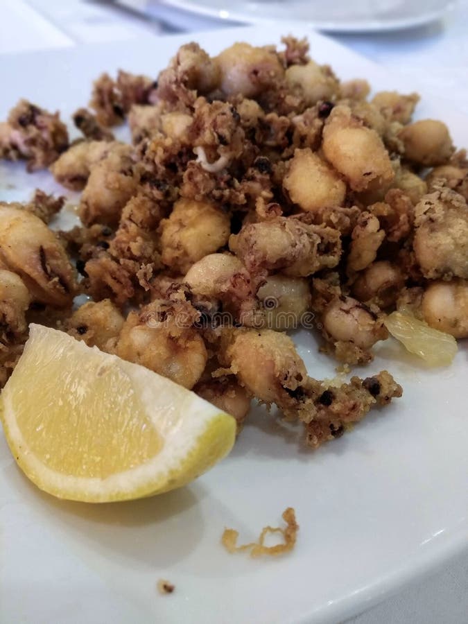 Fried Squid with Lemon and Balsamic Vinegar Stock Photo - Image of ...