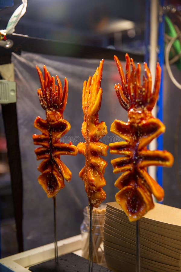 Fried Squid on a Stick stock image. Image of melaka - 388896117