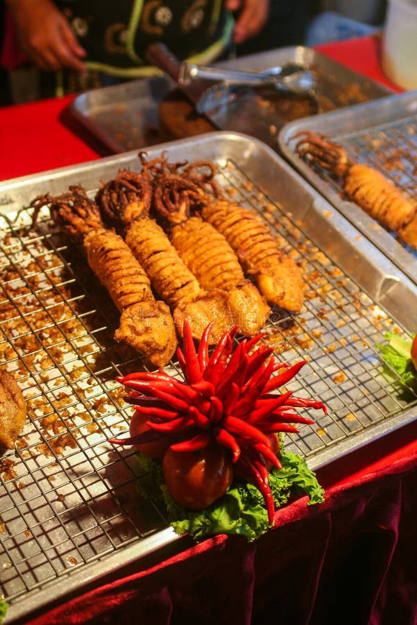Fried squids stock photo. Image of thia, people, squids - 49023044