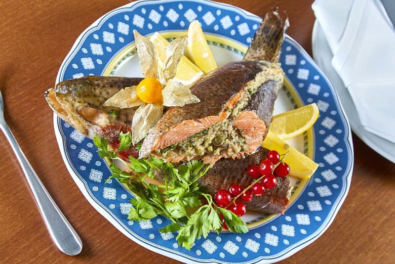 Fried Stuffed Fish on a Platter Festive Menu Stock Photo - Image of ...